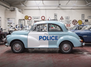 This old Morris Minor police car will be driving through London today